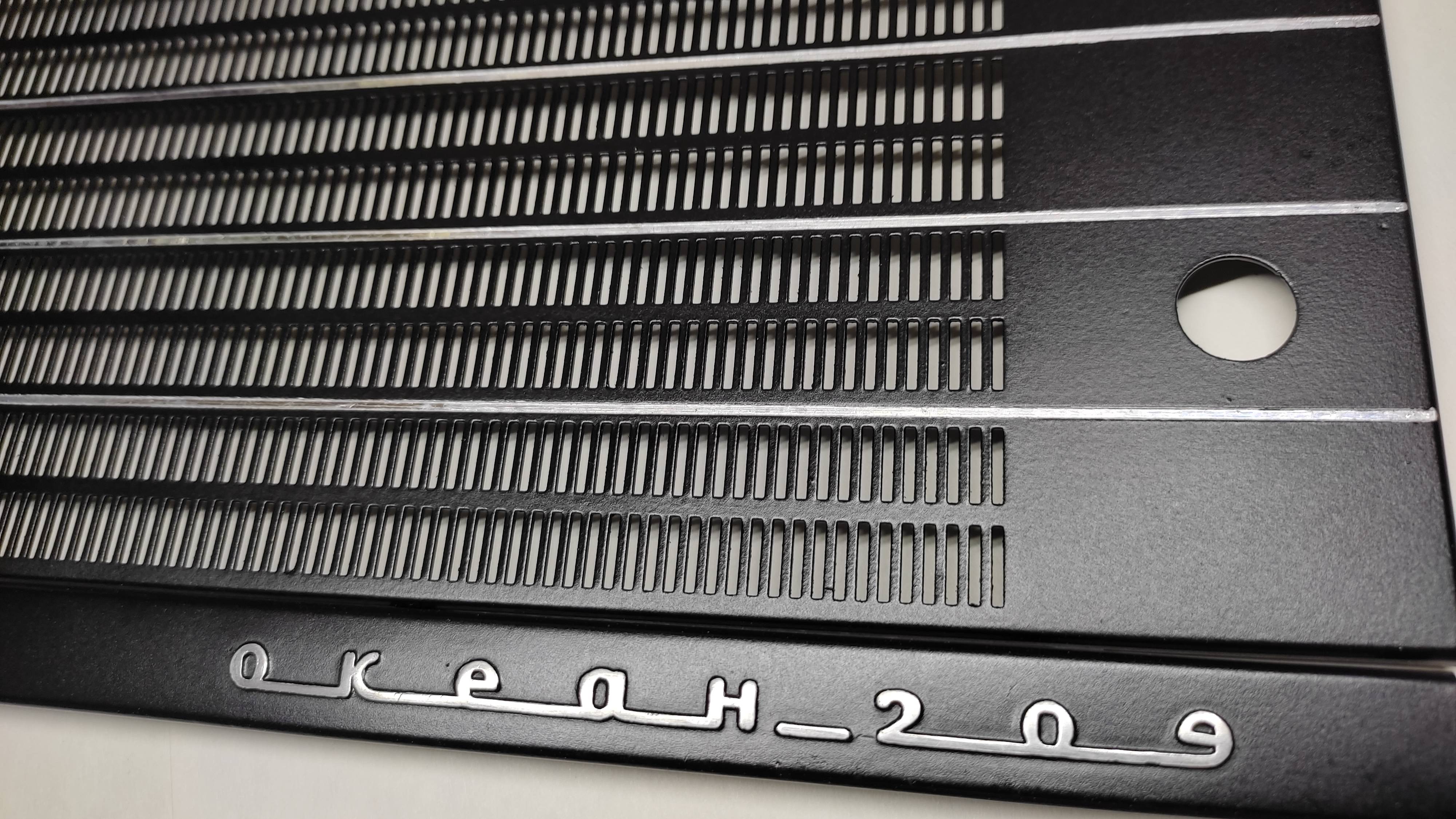 Океан 209. Покраска решетки и планки с логотипом.