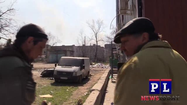 Dead In Mariupol Buried In Parks To Avoid Disease as bodies line the streets.mp4