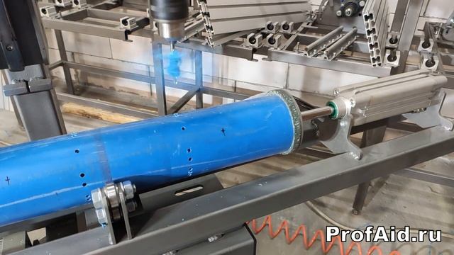 Многошпиндельный сверлильный станок с механизмом поворота заготовки.