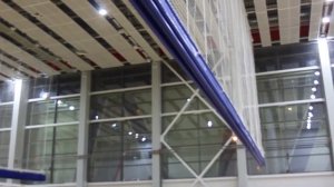 Перегородки для спортивных объектов с двойным виниловым полотном снизу. Dividing curtain for gym.