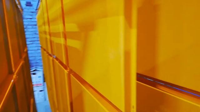 Порошковая покраска фасадных металлокассет в сочный апельсиновый цвет