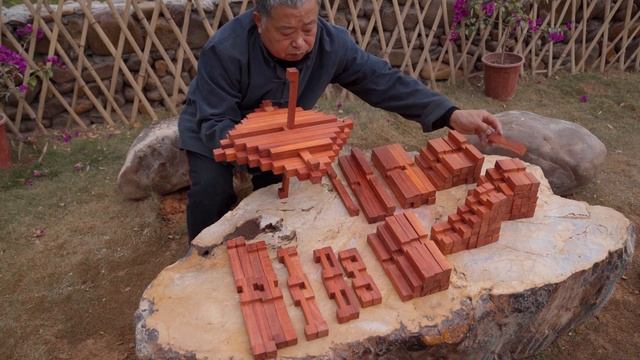 Дедушка Аму сделал огромный любаньский замок - головоломку из 129 деталей