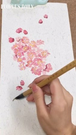 With soft brushstrokes and tasteful use of color, this artist brings forth spring flowers on paper