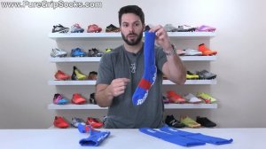 Why do pro footballers wear their socks like this?