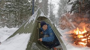 Camping in snowy winter forest. I cook meat on a wood stove. ASMR
