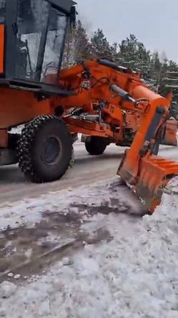 Работа автогрейдера СДМ-25 Чистка снега боковым отвалом