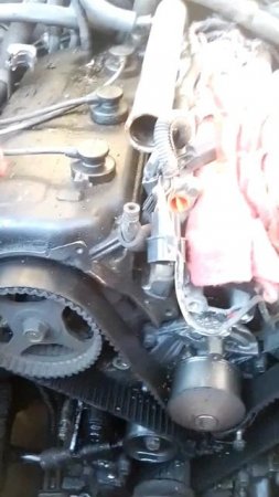 98 mitshubishi montero 3.0 lash adjuster replacement and clean up, check timing belt part 5