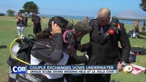 Couple exchanges vows underwater