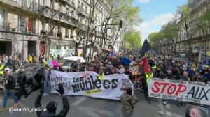 Yellow Vests and Everyday Parisians Demonstrate Against Macron