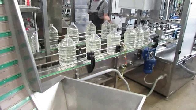Автоматическая линия розлива воды в 5 л. ПЭТ канистры. Производитель ООО «БЛС Инжиниринг».