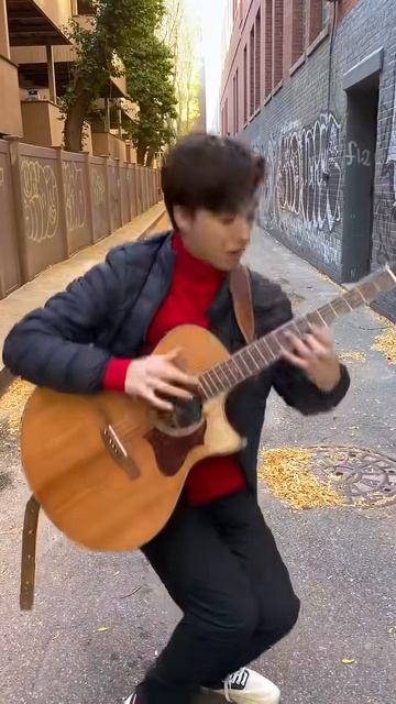 Marcin plays Michael Jackson's ＂Beat It＂ on acoustic guitar (Clip)