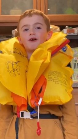 Kid Surprised By Airplane Inflatable Life Jacket #shorts