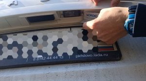 Замена лампочки подсветки номера Лада Гранта