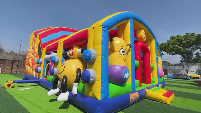Коммерческий надувной батут «Смайлики» с крышей, размер 12x8x7 м
