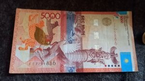 БАНКНОТА 5000 ТЕНГЕ № серии ГГ7795886 на шинели 25-ого Апреля - ДЕНЕЖНЫЙ ПОТОК