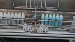 Линия розлива пенящихся продуктов с погружением носиков до дна флакона. Спрей термозащита