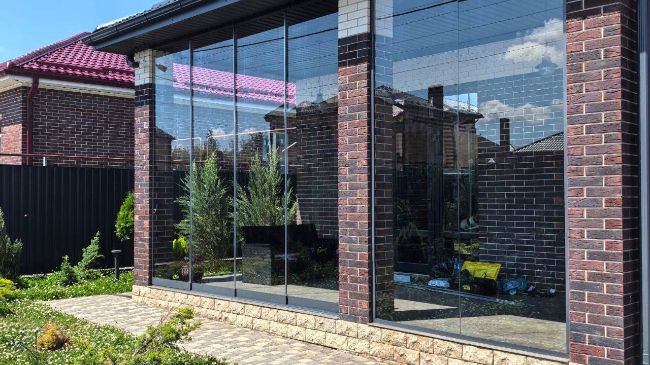 Система безрамного остекления