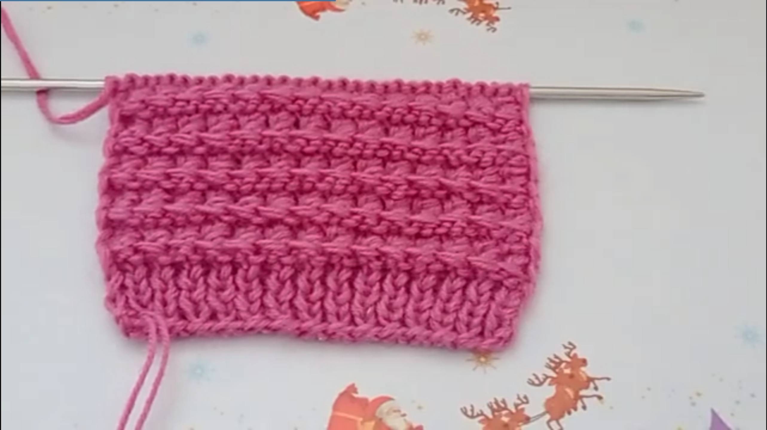 Плотный, рельефный узор спицами.