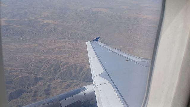 Кыргызстан Бишкек,  аэропорт Манаса, взлет посадка самолета, по летели в Россию в Новосибирск