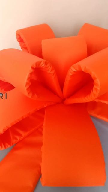 Оранжевый бант 100 см.