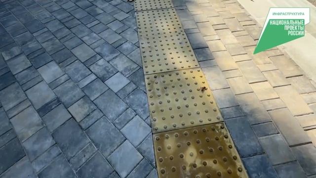 Обновлён сквер на улице Жолио-Кюри: плитка, подсветка и кинетические фигуры