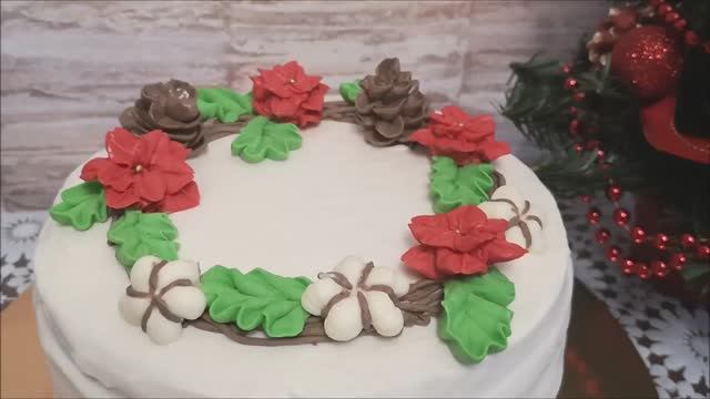 Апельсиновый торт. Разрез.Украшение торта масляным кремом Рождественский цветок,хлопок,шишка