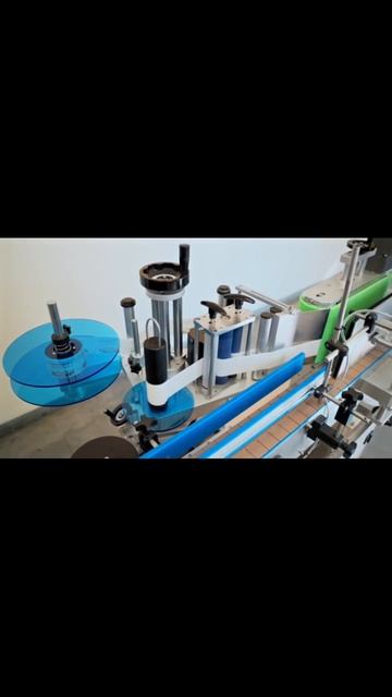 Обзор этикетировочного аппарата для круглой тары