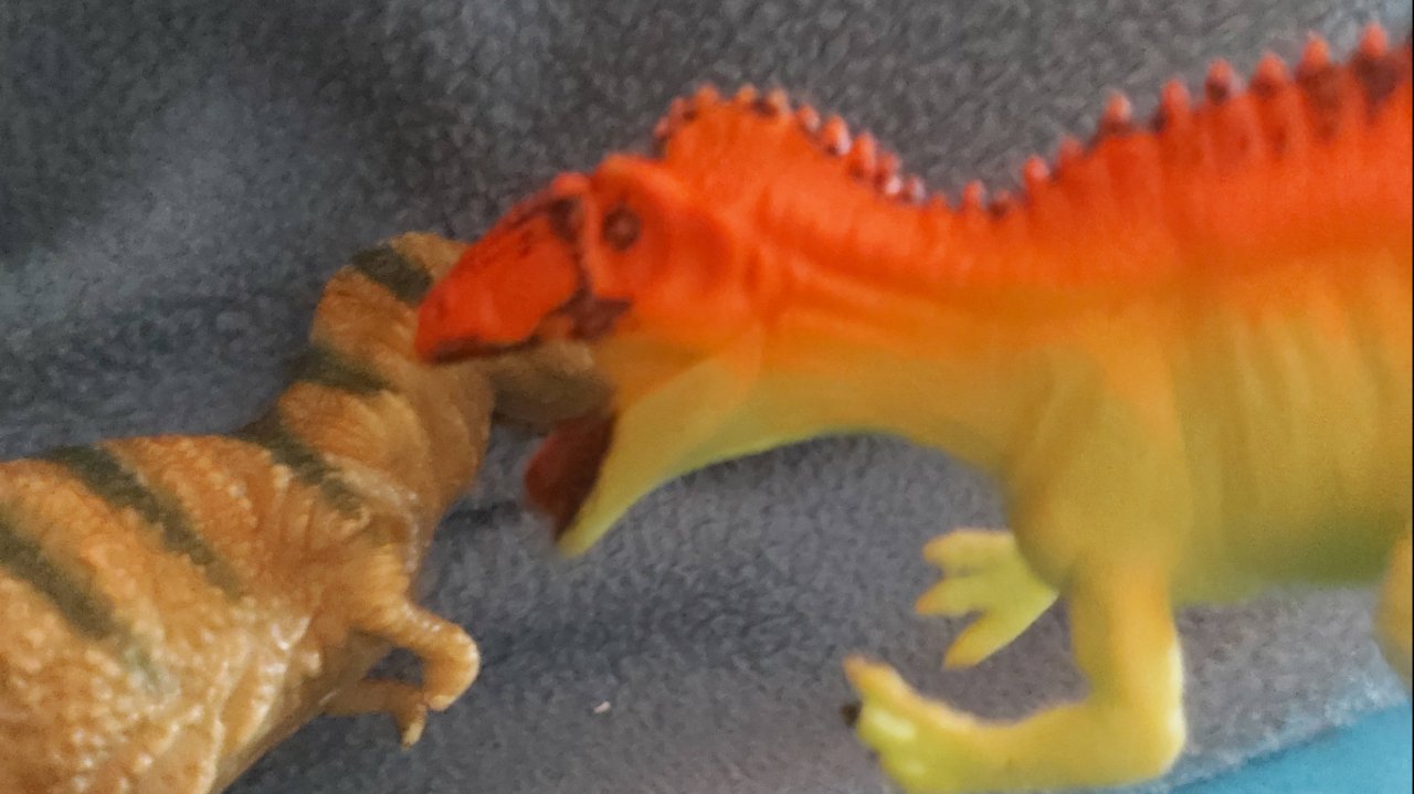 Акрокантозавр против Саурофаганакса