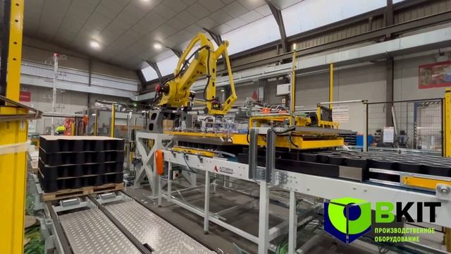 Линия паллетизации железных заготовок с прокладками рядов гофрокартоном