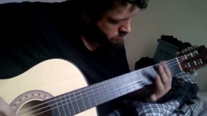 Me playing the 5 dollar Broken Neck Guitar that I fixed.