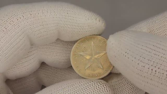 Куба 20 сентаво, 1948 года.