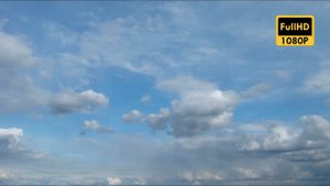 White clouds in the blue sky.