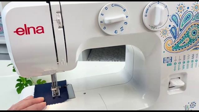 ELNA 1241OK.Регуляторы выбора строчки и длины стежка