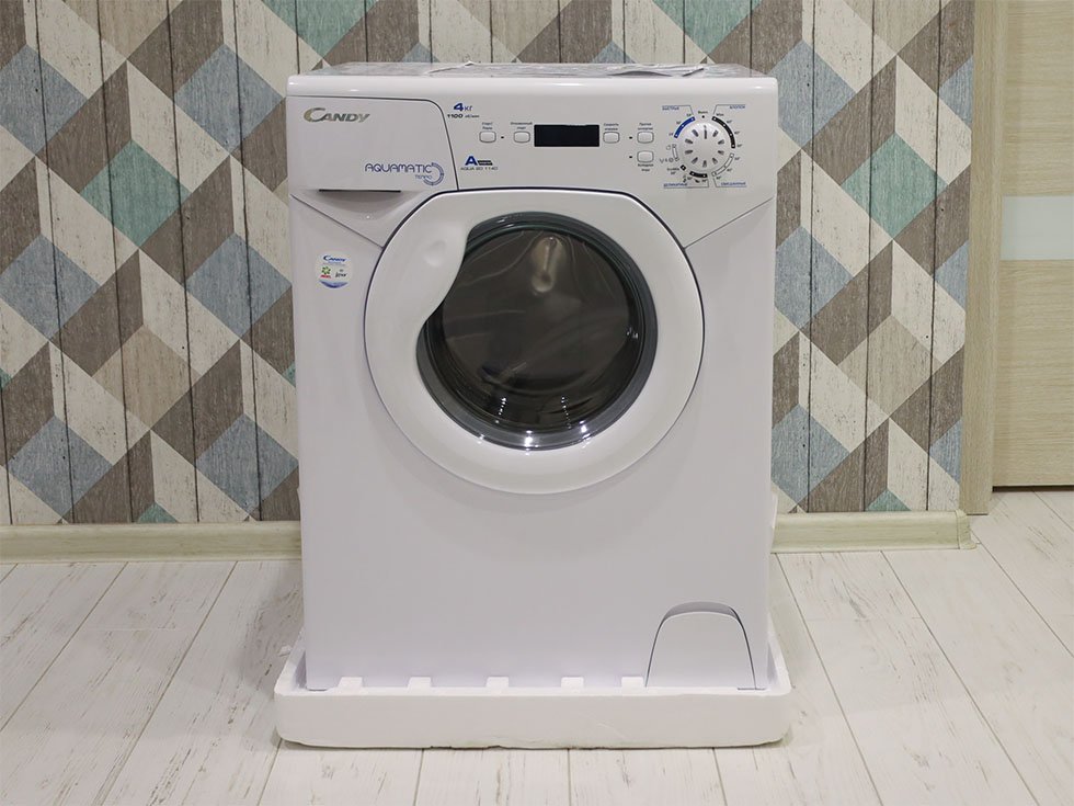 Candy Aquamatic 2D1140 07 - компактная стиральная машина под раковину ...