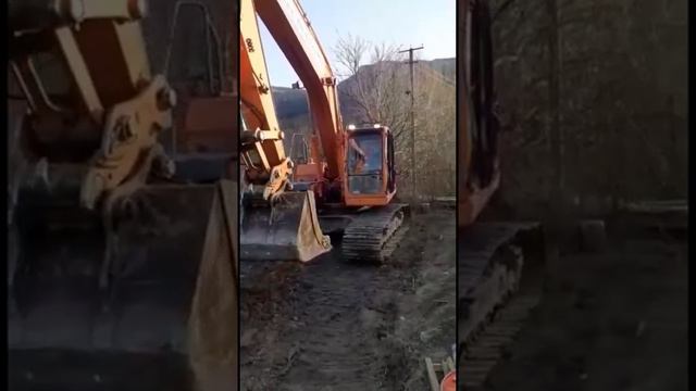 Аренда экскаватора Doosan DX 225 lc. Услуги экскаватора. Короткая версия..