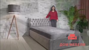 Кровать в эксклюзивном дизайне с каретной стяжкой