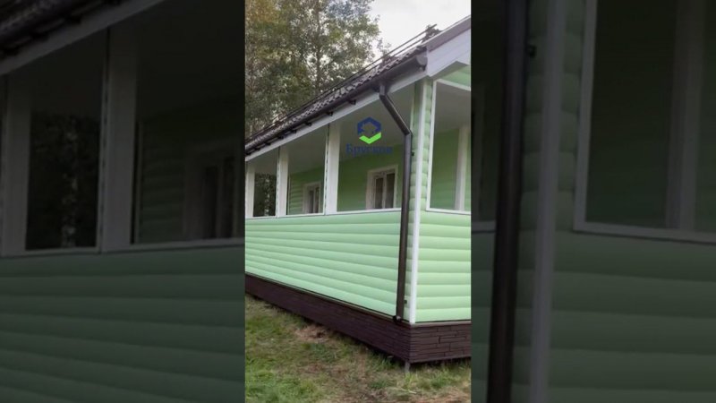 Отделка фасада в каркасном доме 9 на 9 (100 м2) с террасой под ключ