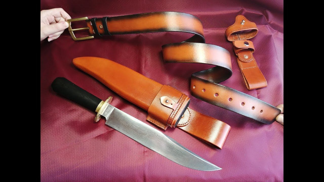 Ножны для ножа с двумя съёмными, сменными подвесами. В комплекте с ремнём. Изделия из кожи. СКСтиль.