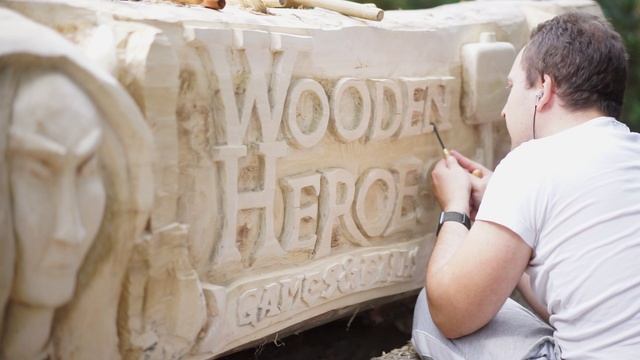 Резьба огромных букв на полене. Логотип канала.