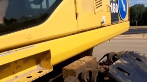 Колёсный экскаватор Komatsu PW 160. Стрела 13 метров. Аренда и услуги спецтехники «Мамонт».