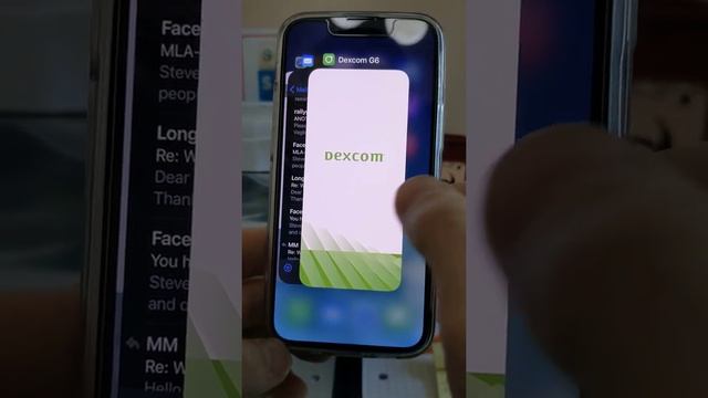 Closing background apps on iPhone.