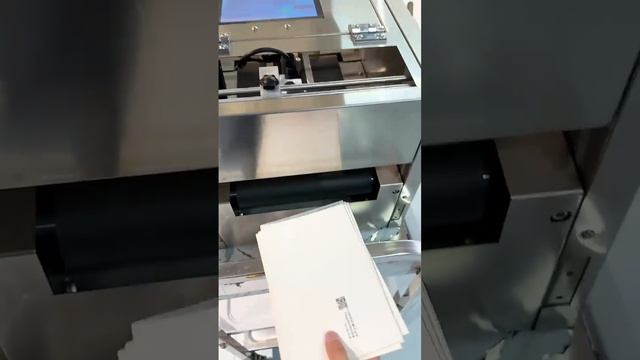 New Products--Page conveyor with our online batch code printer system