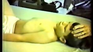 Dr. Ida Rolf (founder of Rolfing) treating a child