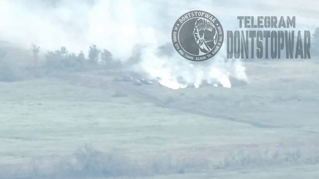 Задымленная поврежденная техника ВСУ на минном поле в районе Работино/Damaged on a min AFU vehicles