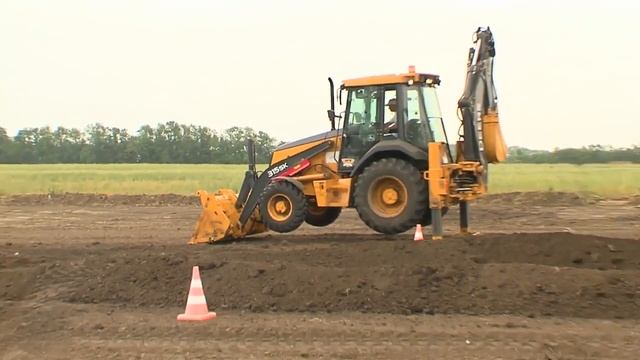 Экскаватор погрузчик John Deere