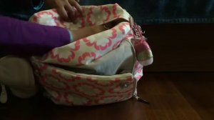 Petunia Pickle Bottom Boxy Backpack: diaper bag packed for an international flight with Ju Ju Be