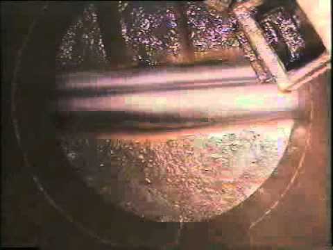 Гидродинамическая очистка тянущей насадкой с исходящей струей