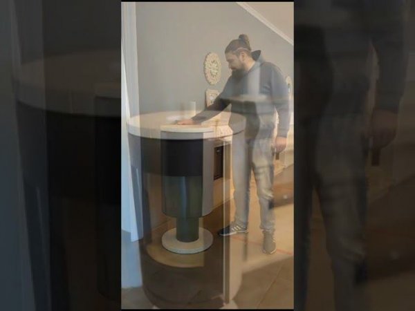 Современный российский печь-камин Астов R 1.0 с облицовкой песчаником и системой вращения на 360 *