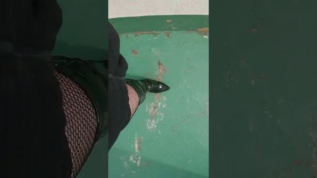 Walking around the lighthouse wearing my usual enamel black knee highs