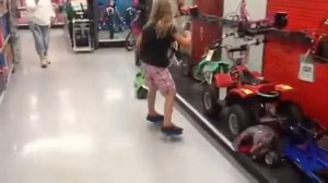 Munchkin on a Ripstik in Toys R Us